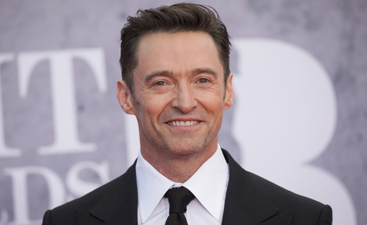 Hugh Jackman Drives 'Laughing Man Truck' Serving Fans With Coffee